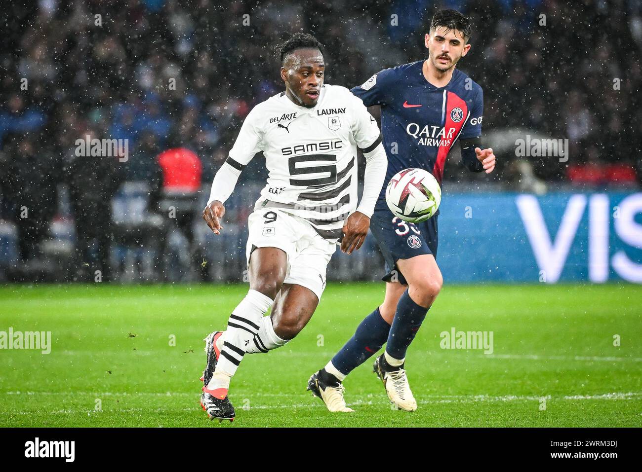 Arnaud KALIMUENDO of Rennes and Lucas BERALDO of PSG during the French ...