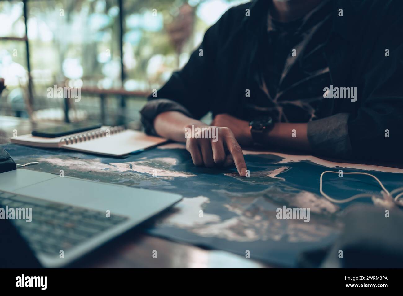 Finger pointing route on map hi-res stock photography and images - Alamy