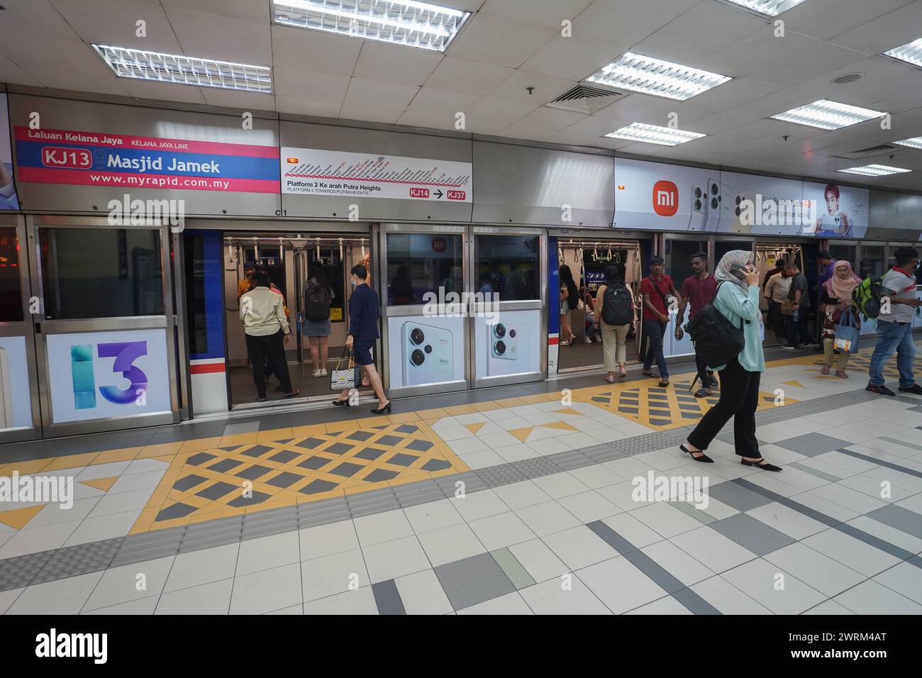 Commuters at Kuala Lumpur Light Rapid Transit Line , Malaysia Stock ...