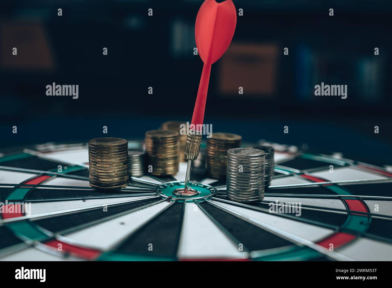 dart board has dart arrow hitting of a shooting target for business ...
