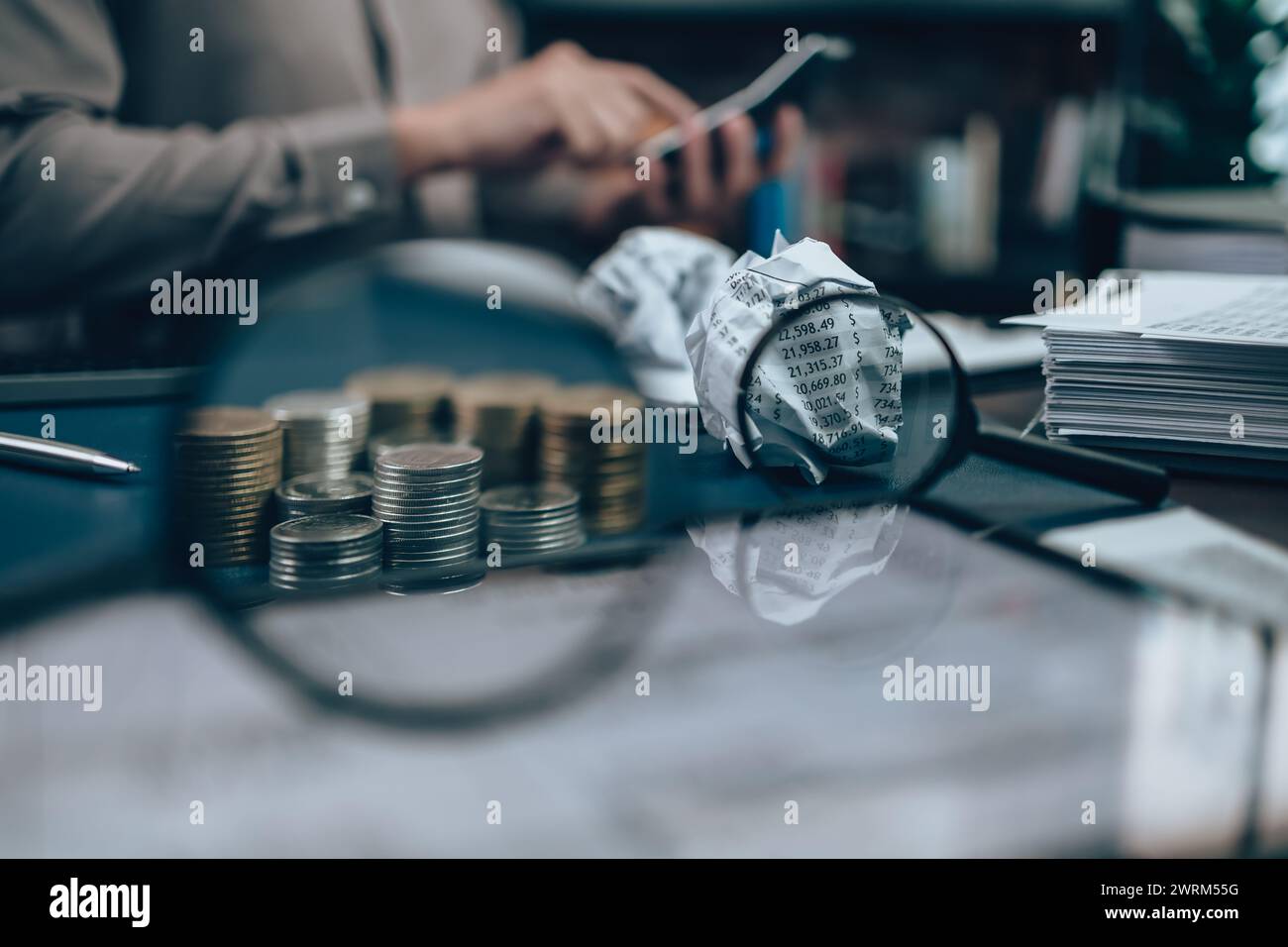 Magnifying glass see coin and fail paper crump. Accounting check ...