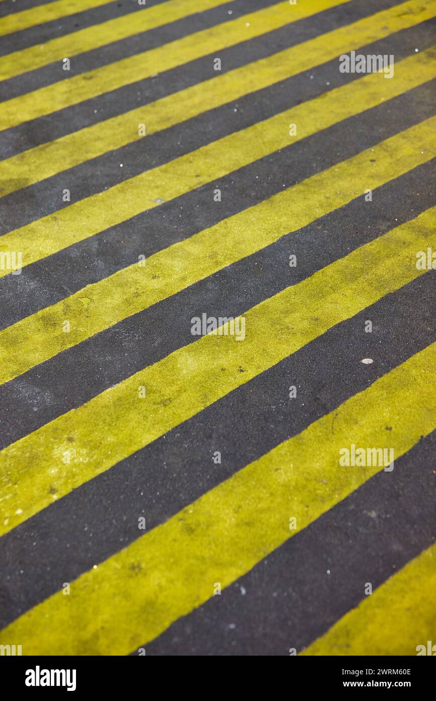Diagonal yellow stripes hi-res stock photography and images - Alamy