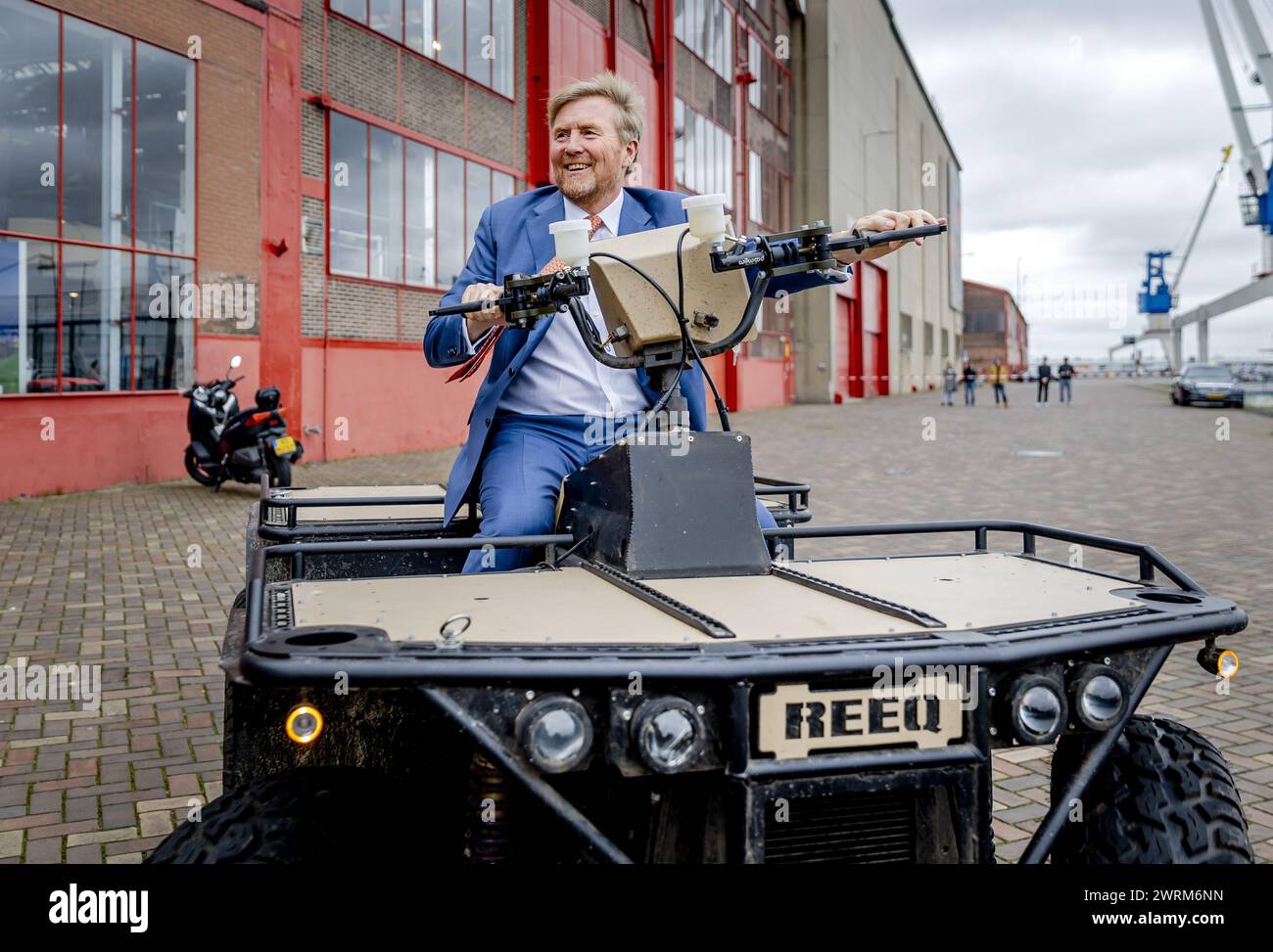 ROTTERDAM - King Willem-Alexander rides a quad during a working visit ...