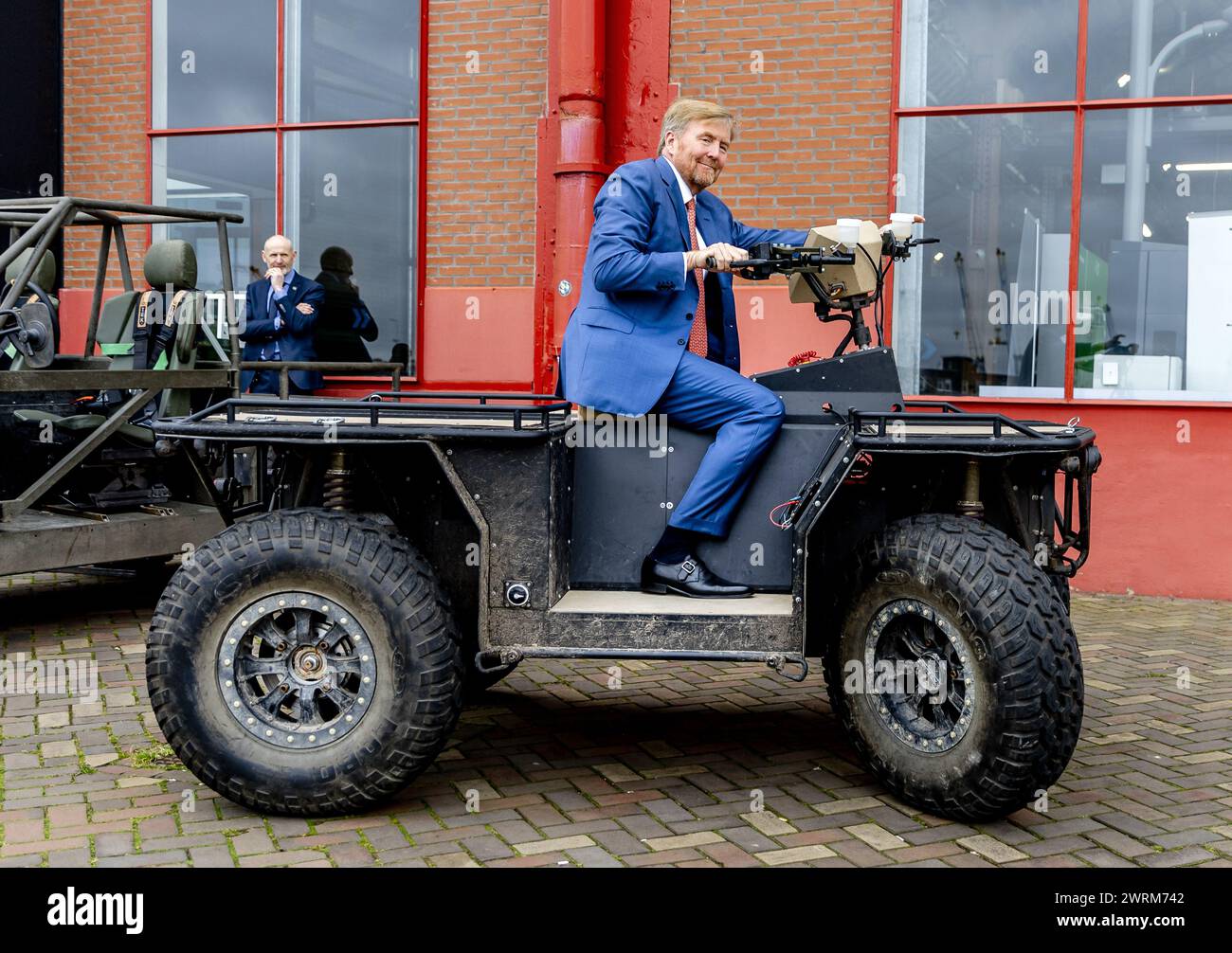 ROTTERDAM - King Willem-Alexander rides a quad during a working visit ...