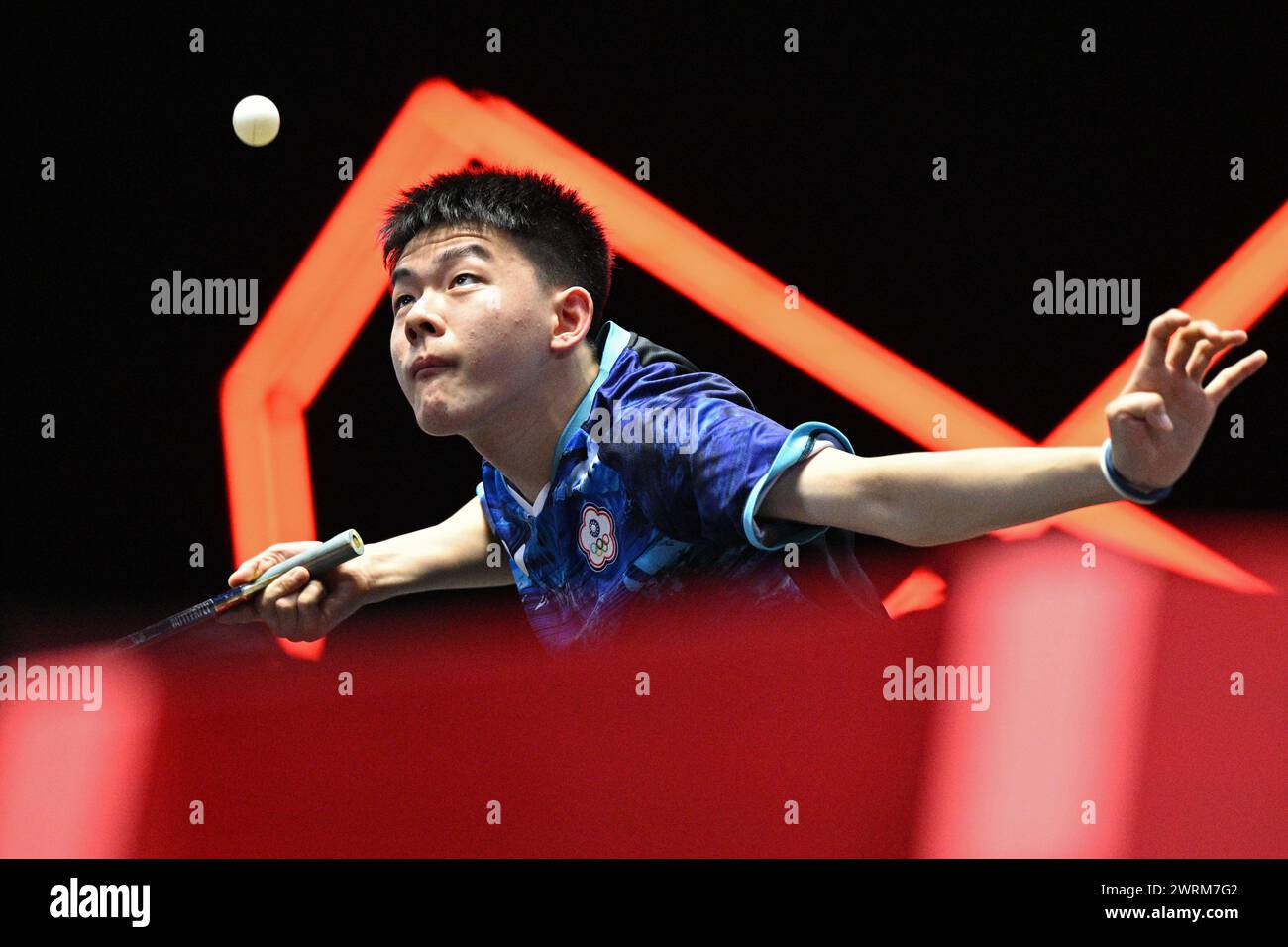 Singapore. 13th Mar, 2024. Kao Cheng-Jui of Chinese Taipei serves ...