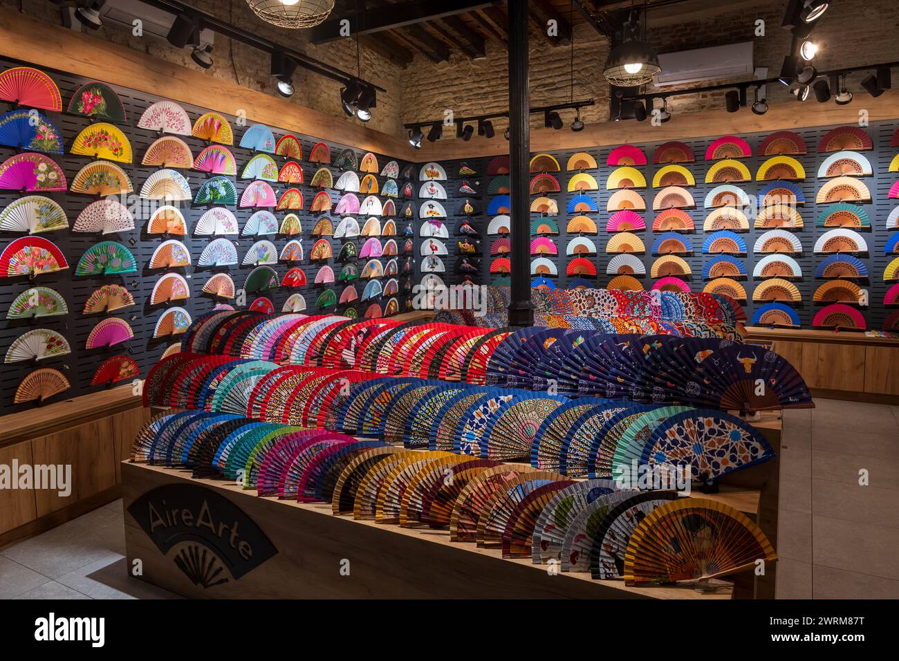 Shop with traditional painted hand fans in city of Seville, Andalusia ...