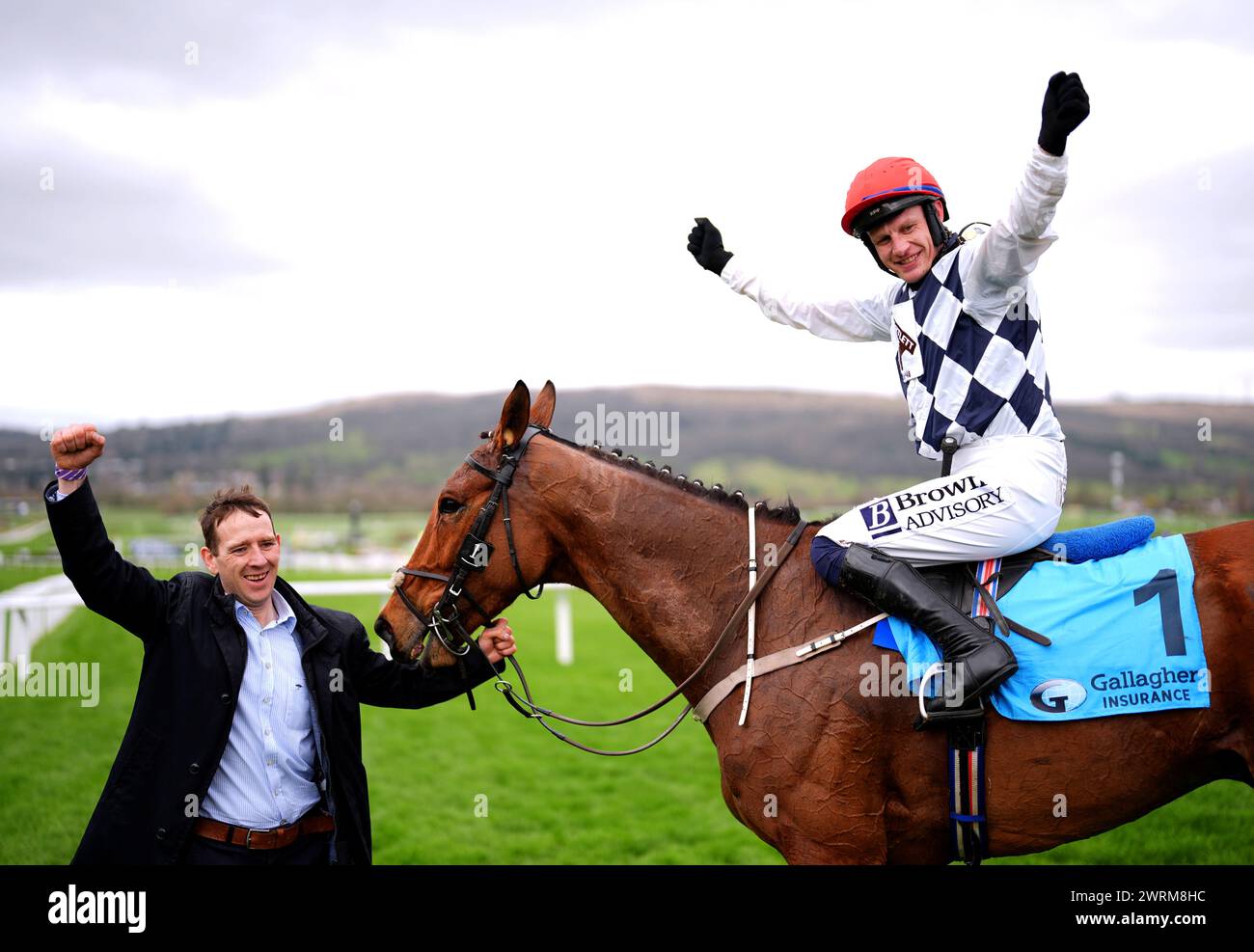 Jockey Paul Townend celebrates on Ballyburn after winning the Gallagher ...