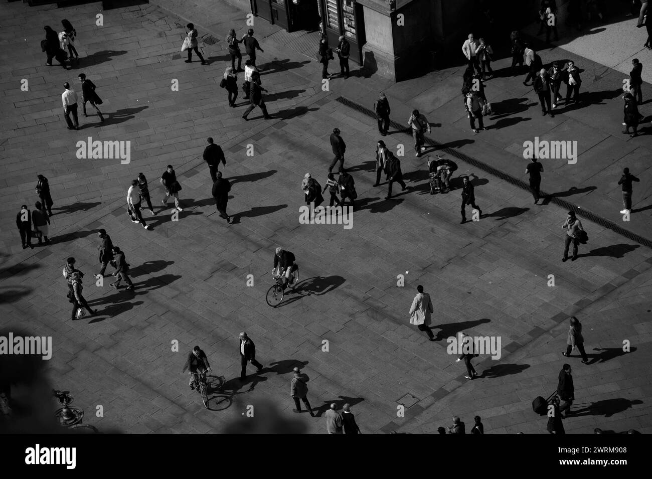 People crowd walking by Piazza del Duomo Milan Italy near Gallería ...