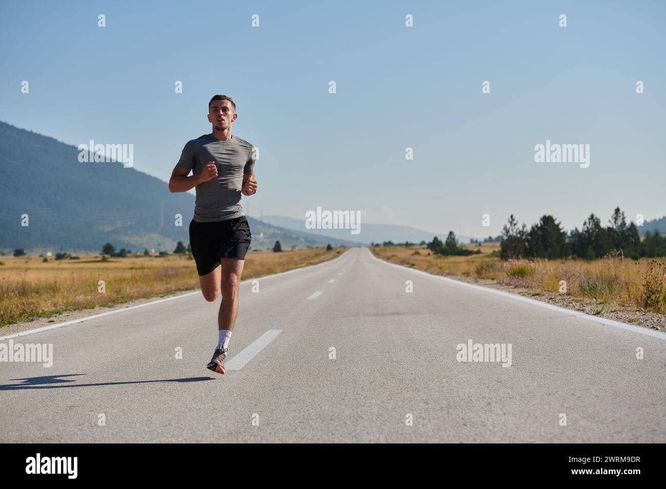 A dedicated marathon runner pushes himself to the limit in training ...