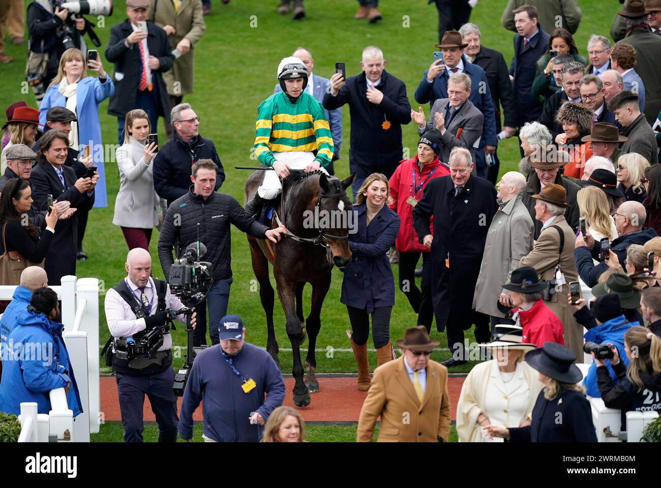 Mark Walsh aboard Fact To File after winning the Gallagher Novices ...