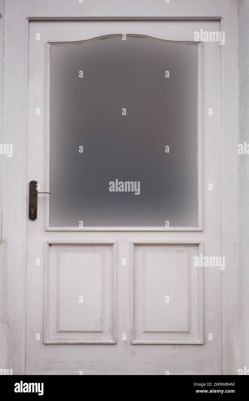 simple old style white door with a glass cover Stock Photo - Alamy