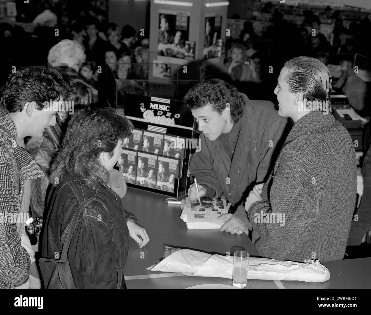 ROLAND ORZABAL and CURT SMITH of TEARS FOR FEARS signing copies of ...