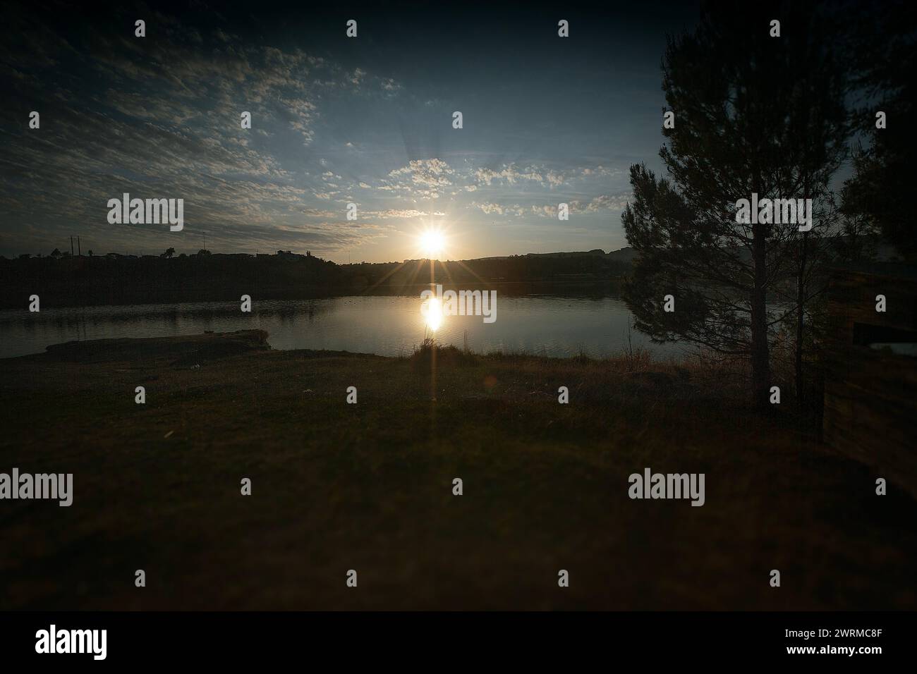 Banks of Maqilika Dam at dawn. The Maqalika Reservoir was built in 1983 ...