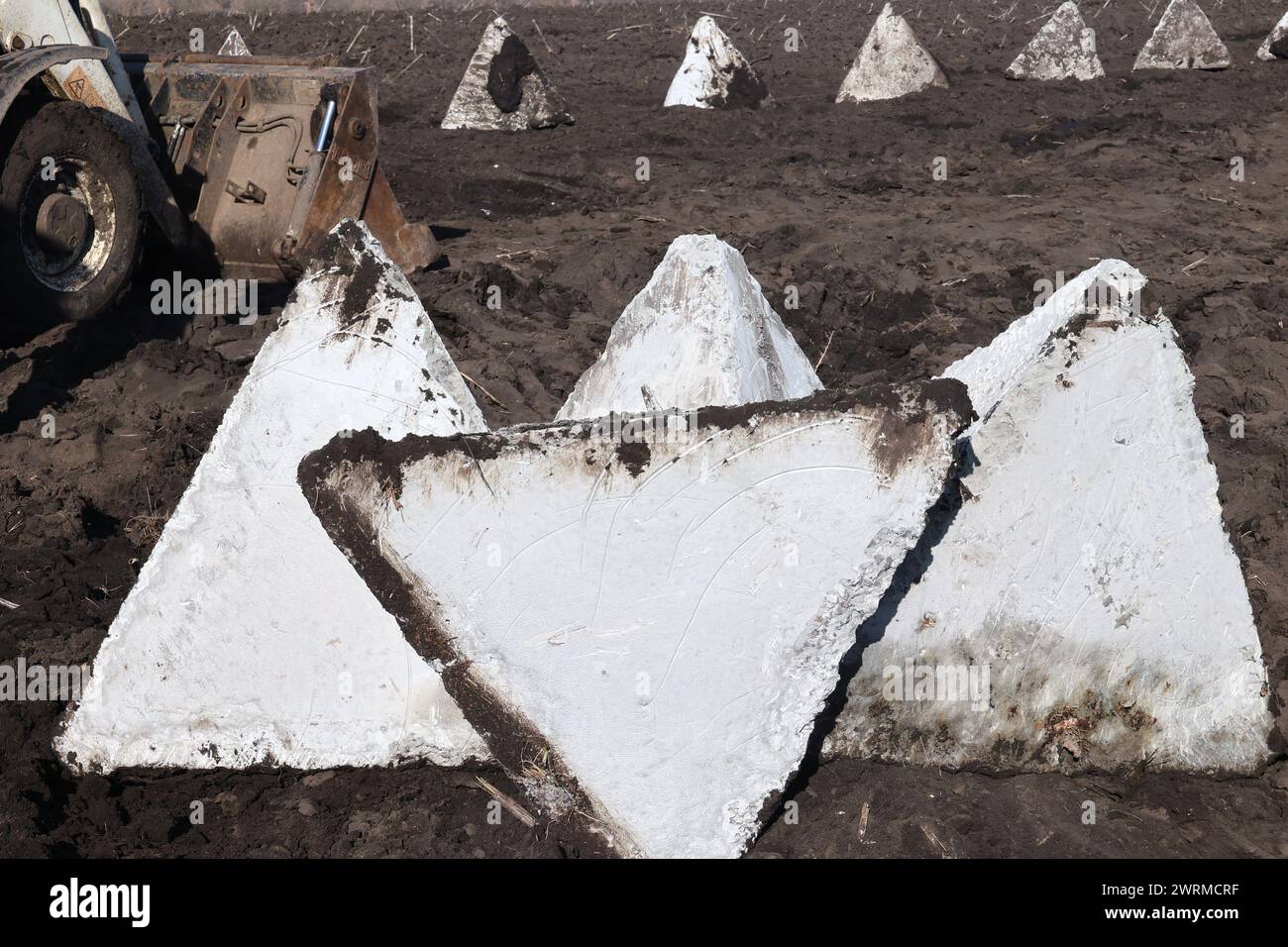 KHARKIV REGION, UKRAINE - MARCH 12, 2024 - Concrete anti-tank ...