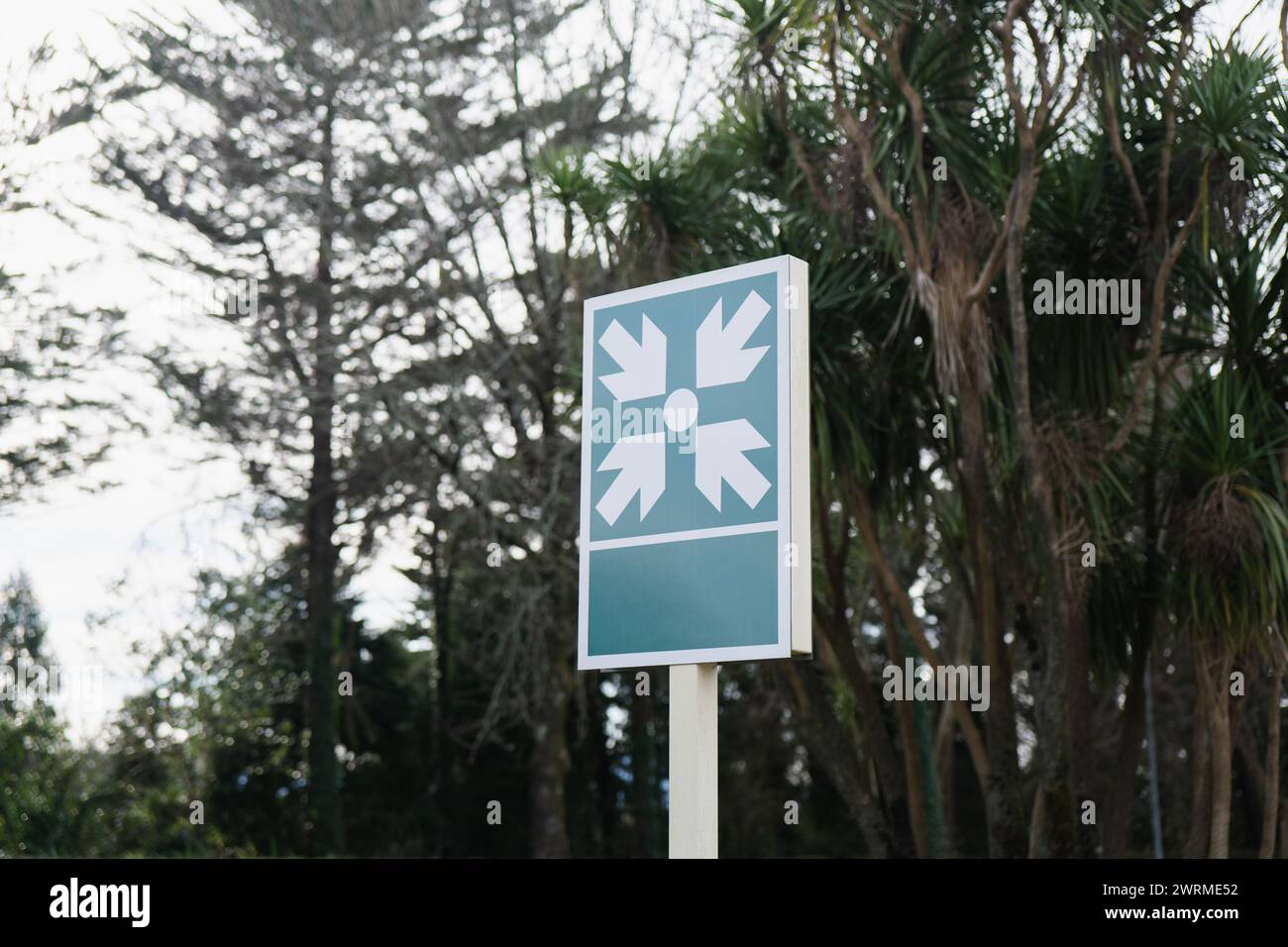 A tranquil outdoor scenery highlighting a sign with an air conditioning ...