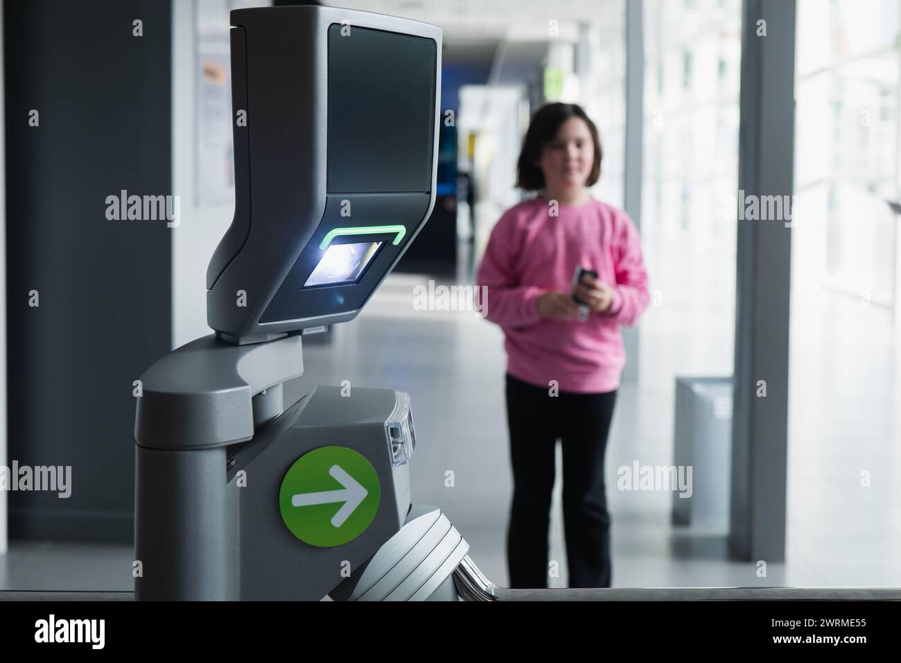 A modern automatic ticket reading machine stands at a science museum ...