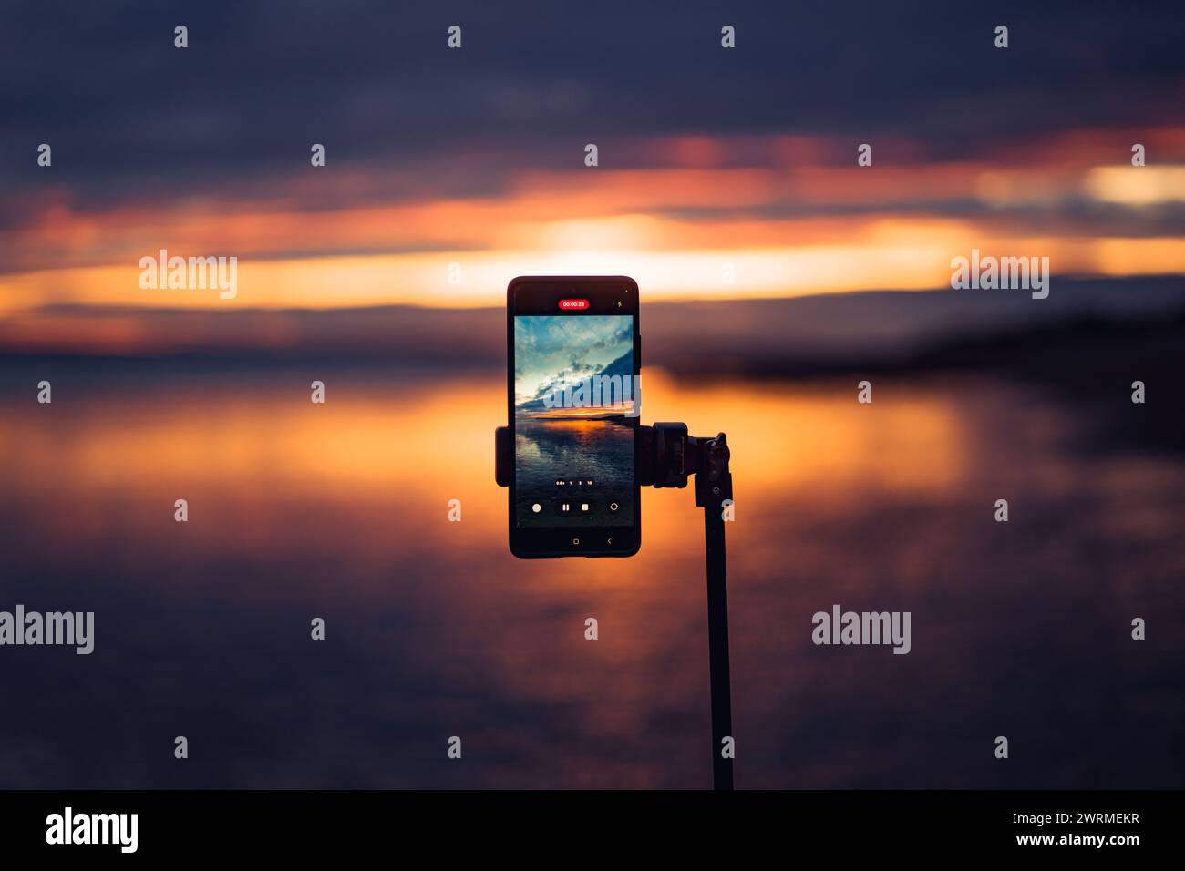 Photo of a photo of a sunset Stock Photo - Alamy