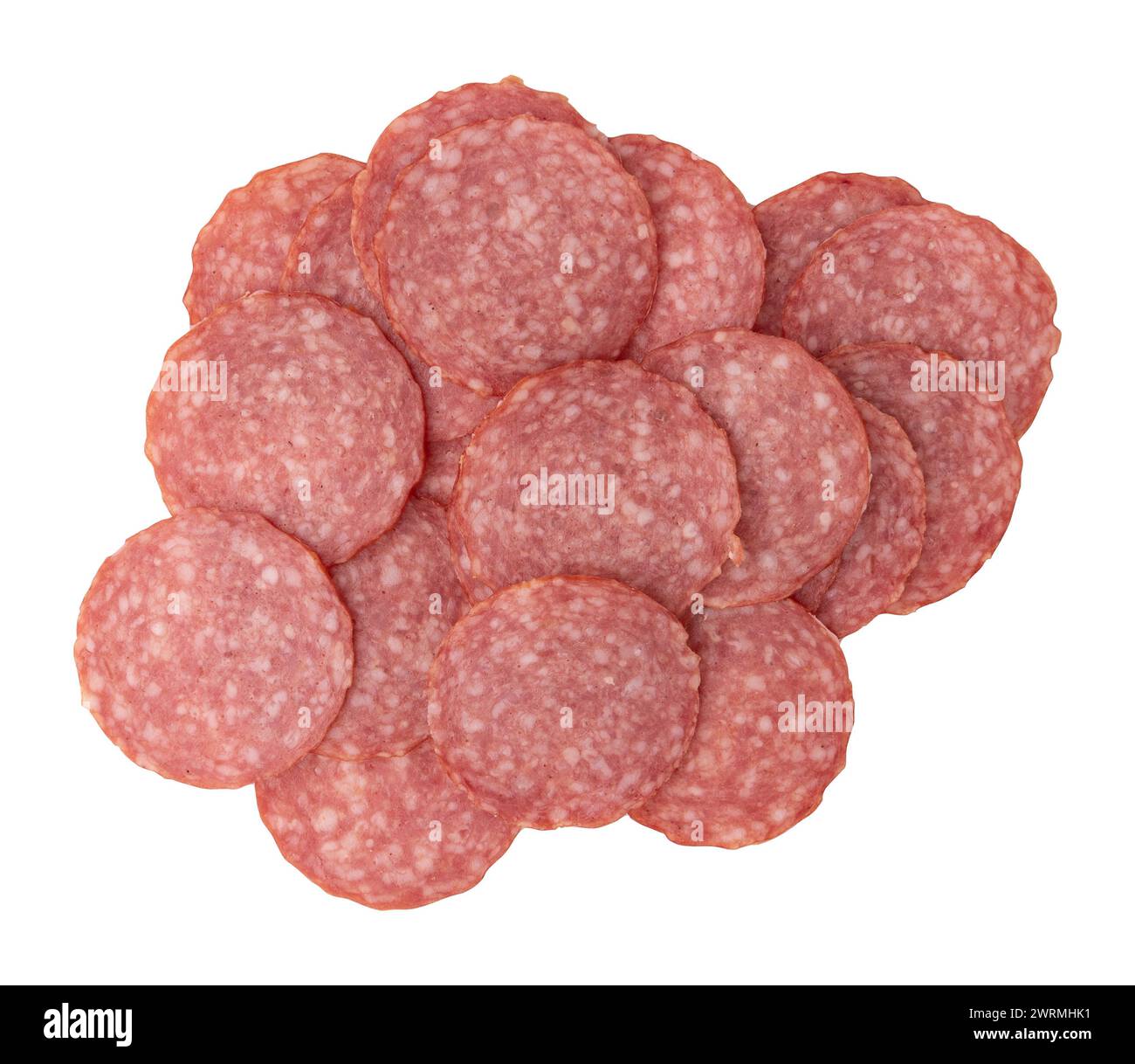 heap of pieces sliced salami sausage laid out to create layout, salami sausage slices isolated ...