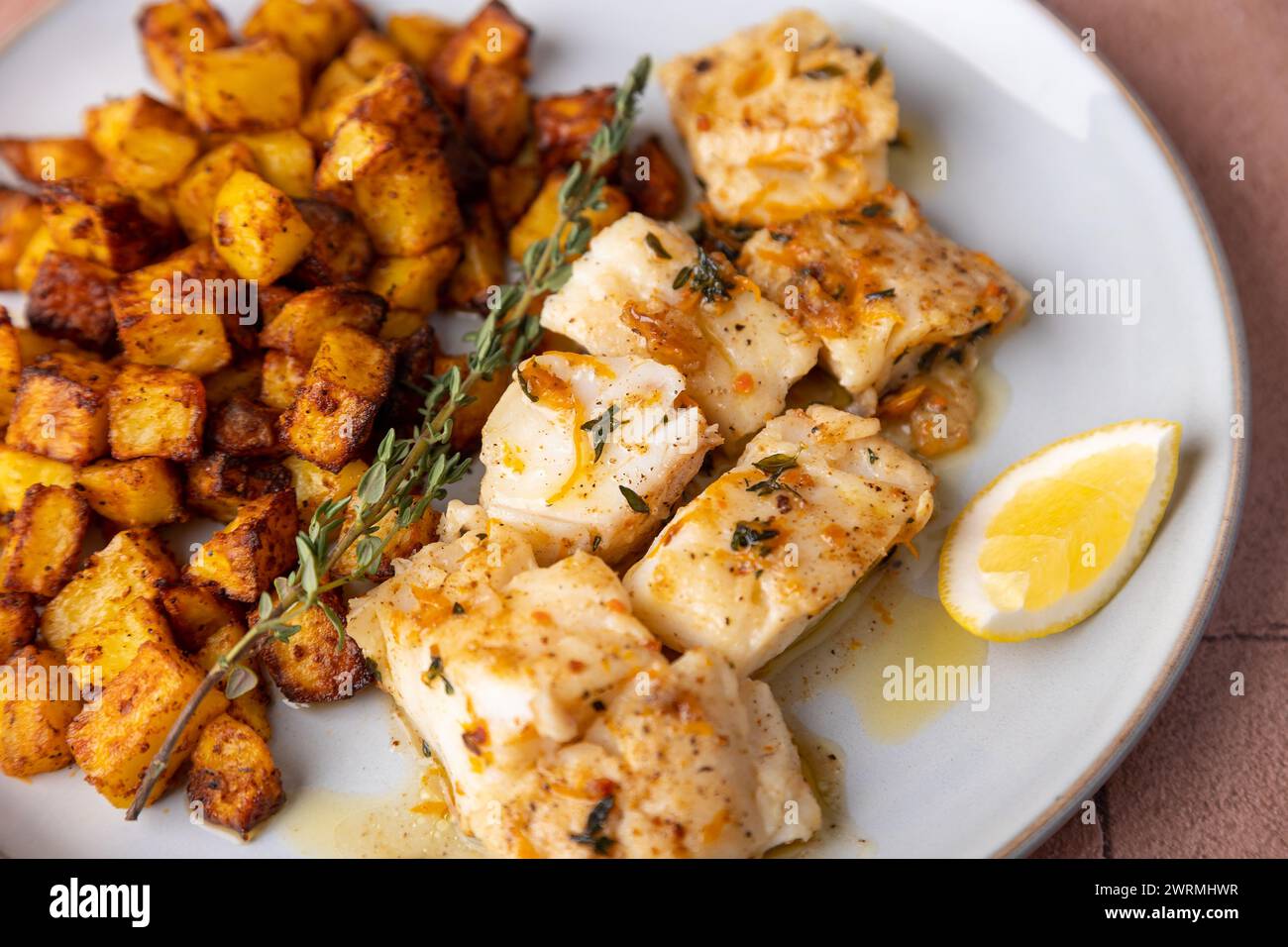 Baked cod lemon slices hi-res stock photography and images - Alamy