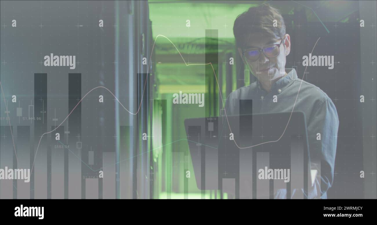 Image of data over asian male it engineer with laptop by computer ...