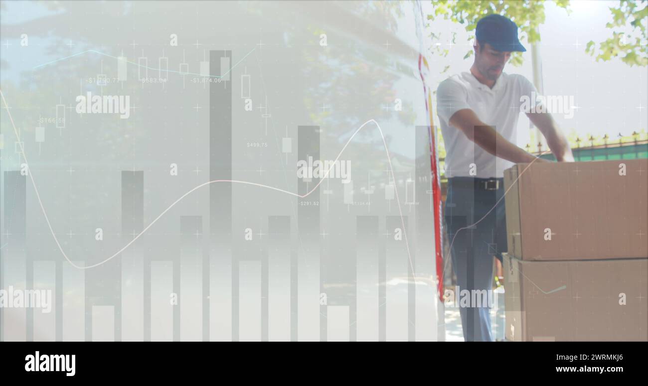 Low angle of a male Caucasian worker moving packages on a trolley from ...