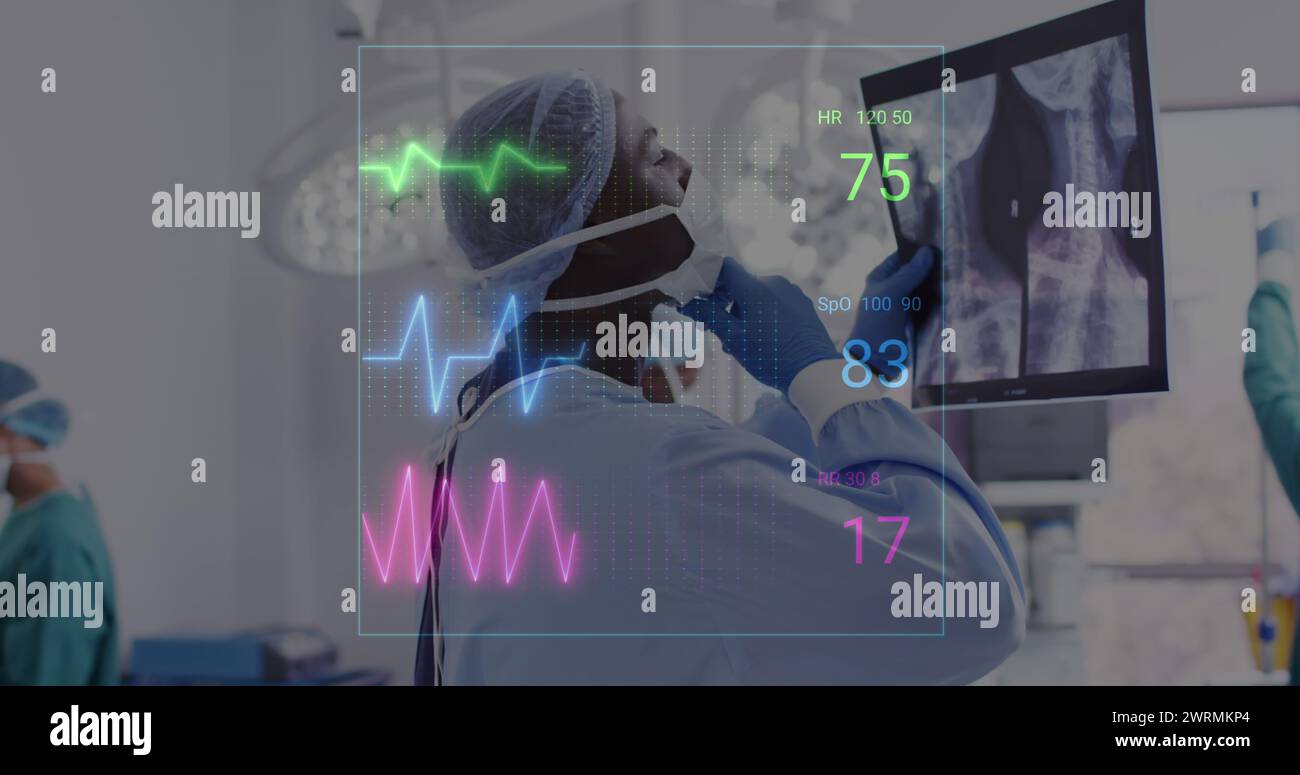 Image of vital signs readings over african american male surgeon ...