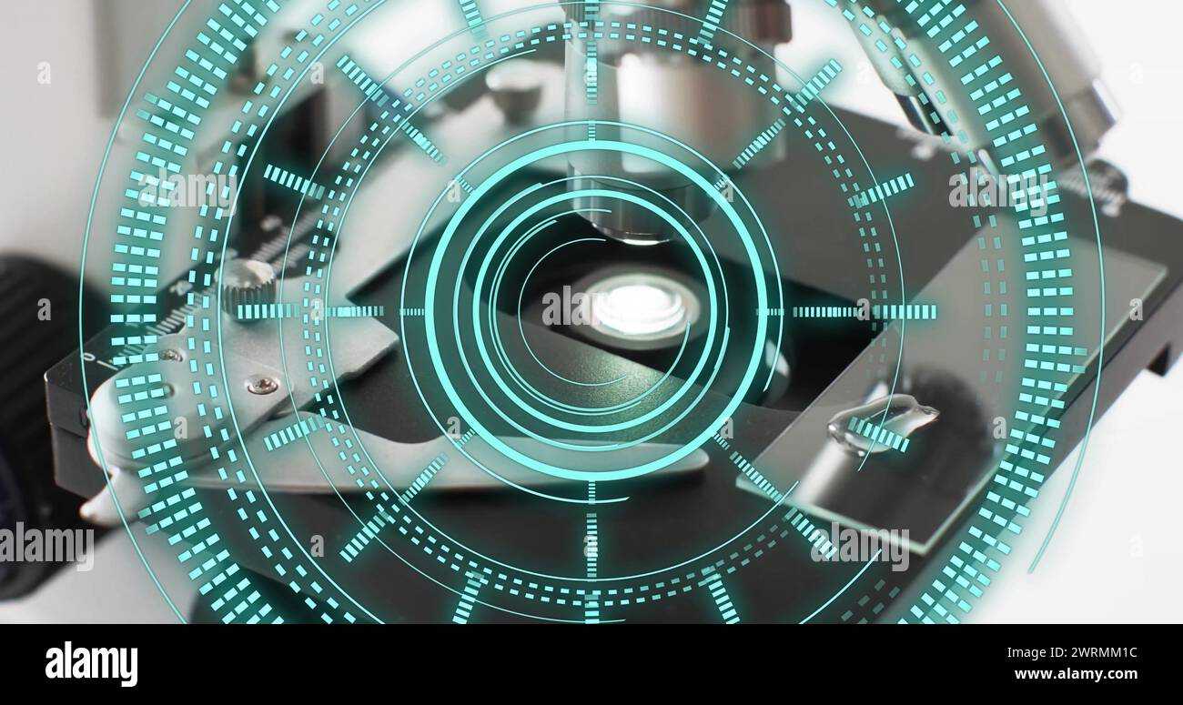 Image of scope scanning over laboratory microscope on white background ...