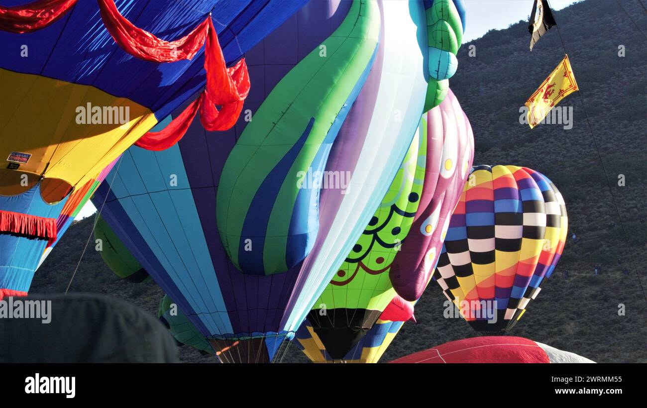 4 balloons taking off from the festival grounds Stock Photo - Alamy