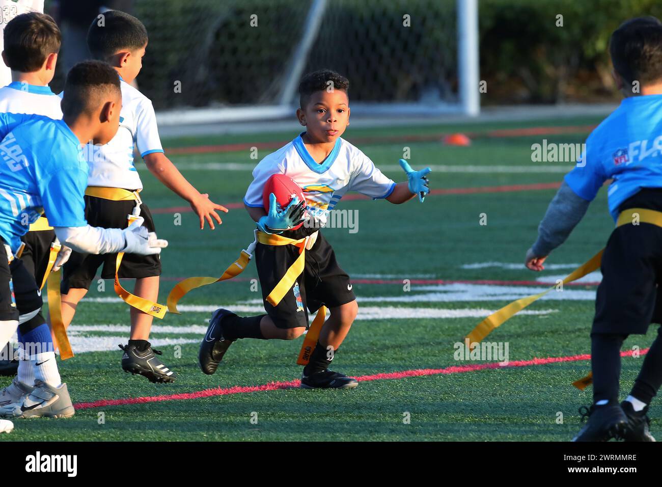 Youth Football players participate during the Snoop & House Flag ...