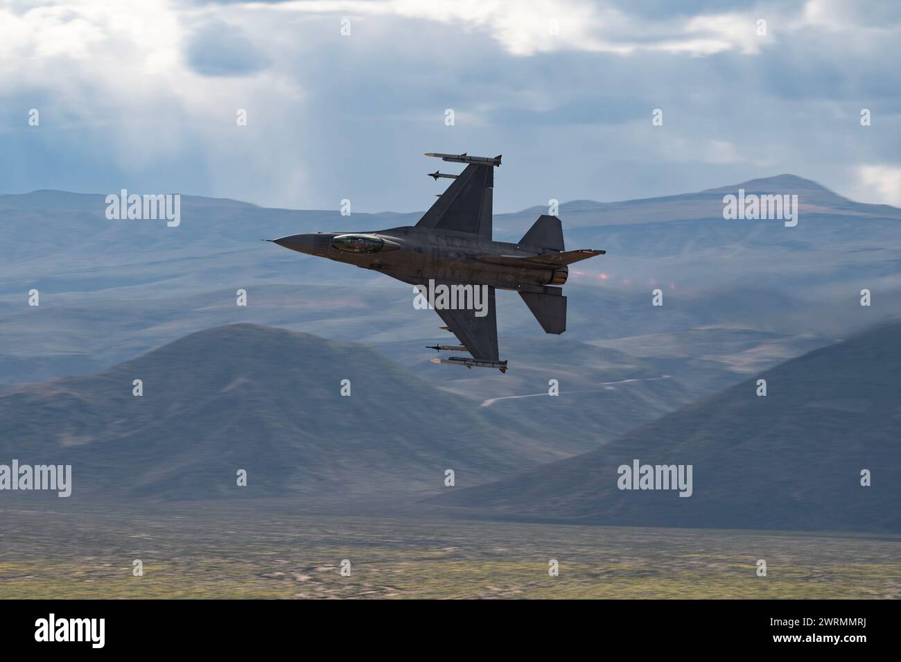 An F-16C Fighting Falcon assigned to the 706th Aggressor Squadron ...