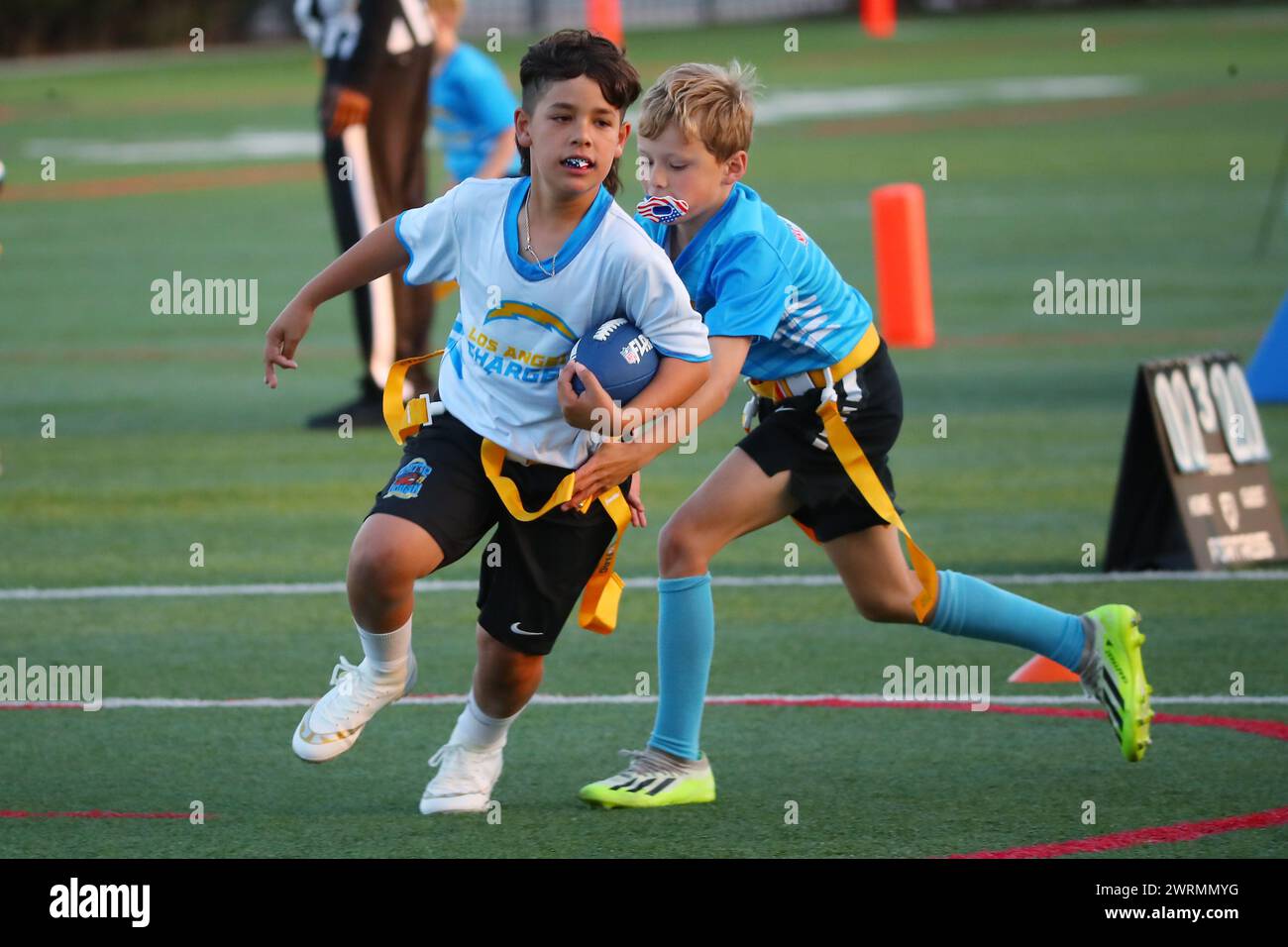 Youth Football players participate during the Snoop & House Flag ...