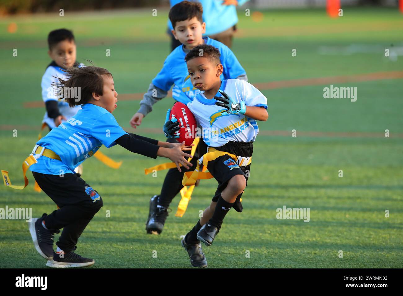 Youth Football players participate during the Snoop & House Flag ...
