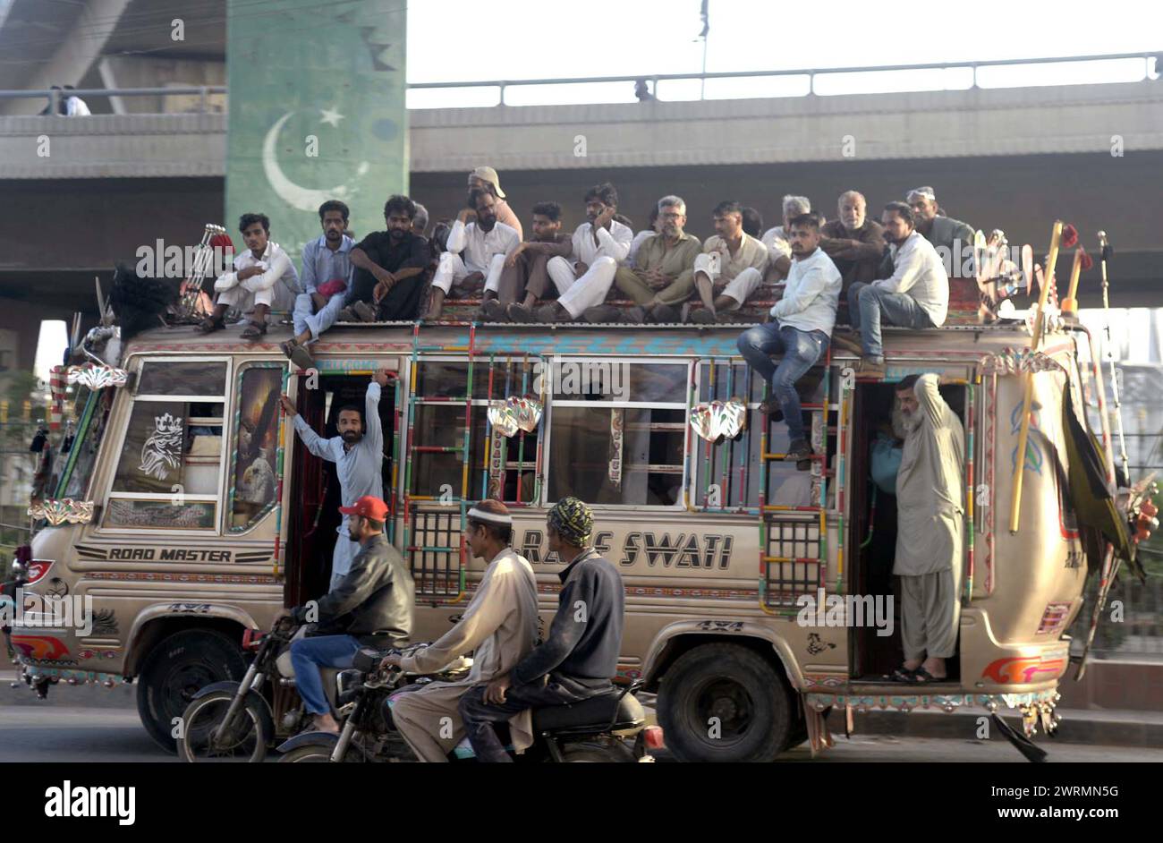 Passengers travelling on an overloaded bus as the shortage of public ...
