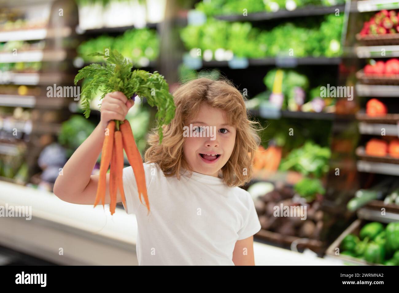 Child in food shop in supermarket store. Kids shopping in food ...