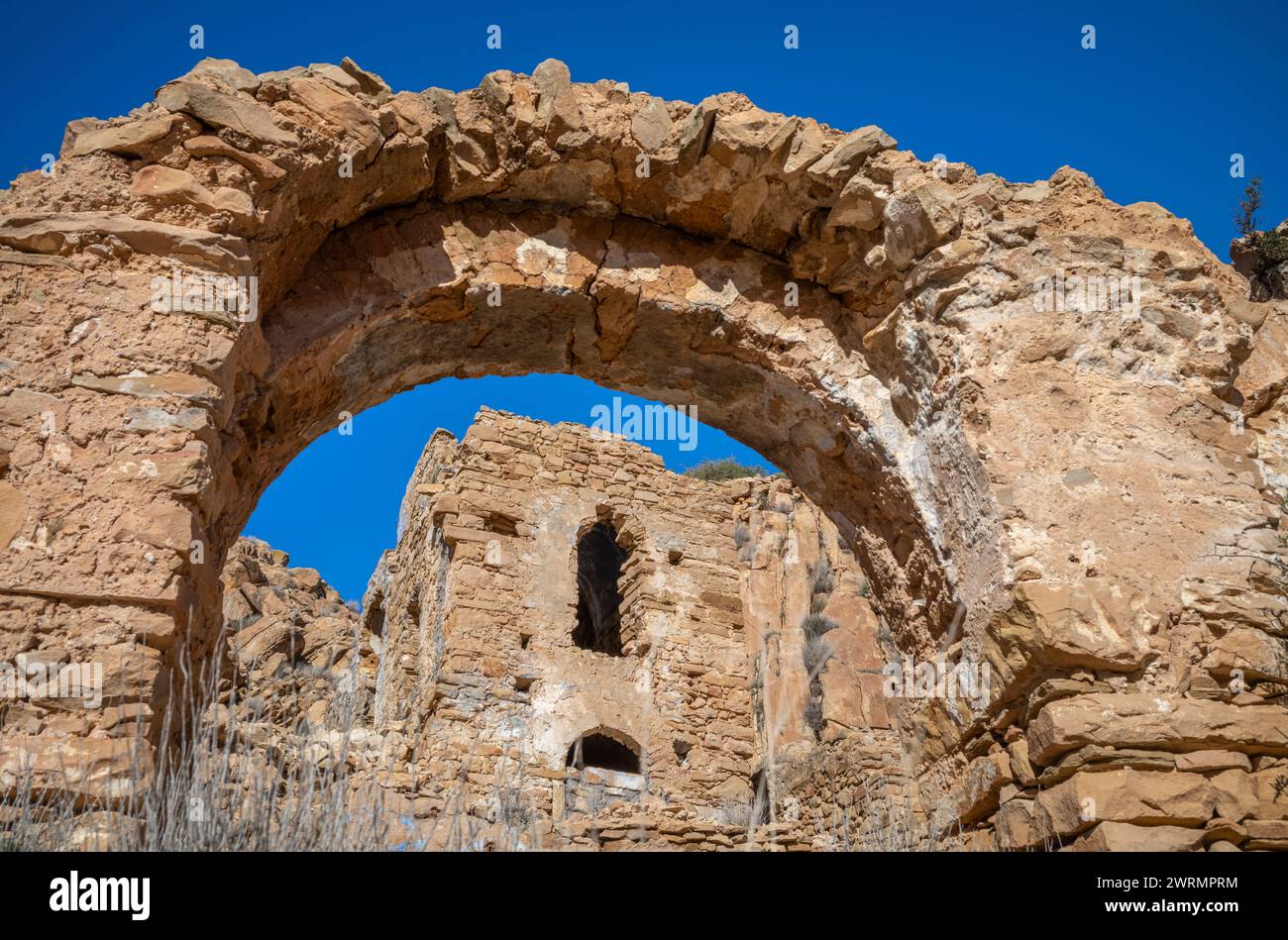 Ruined buildings in the abandoned hilltop Berber village called Zriba ...