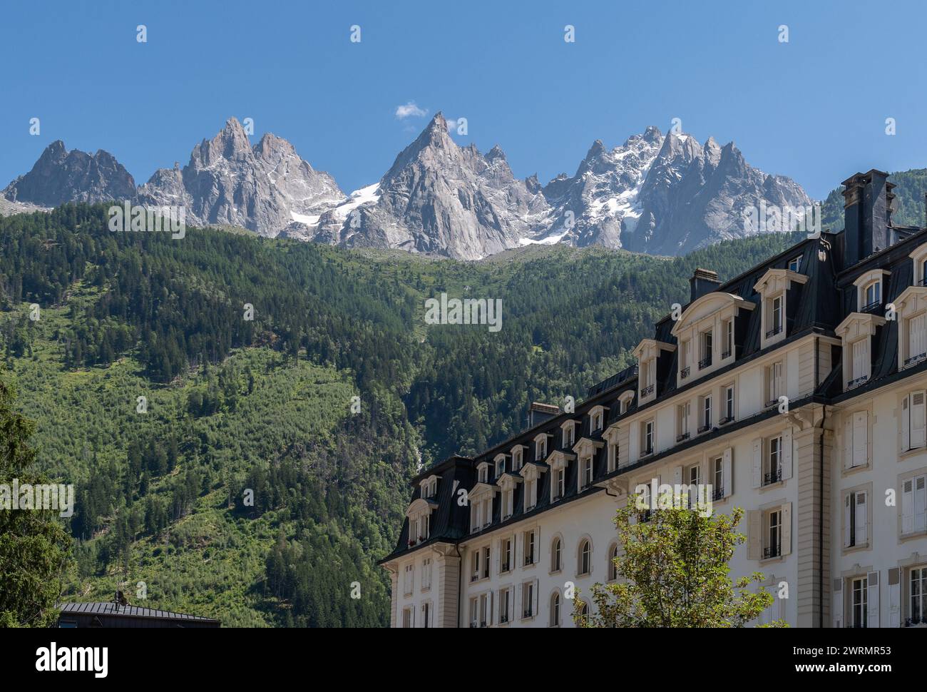 Historic building in Belle Epoque style with the Aiguilles, a group of ...