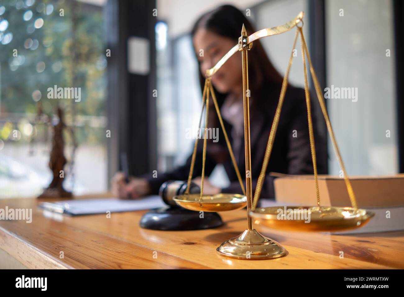 Brass scales are placed on lawyers desks in legal advice offices as a ...
