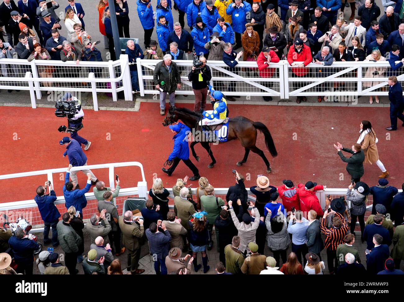 Langer Dan ridden by jockey Harry Skelton is led into the winners ...
