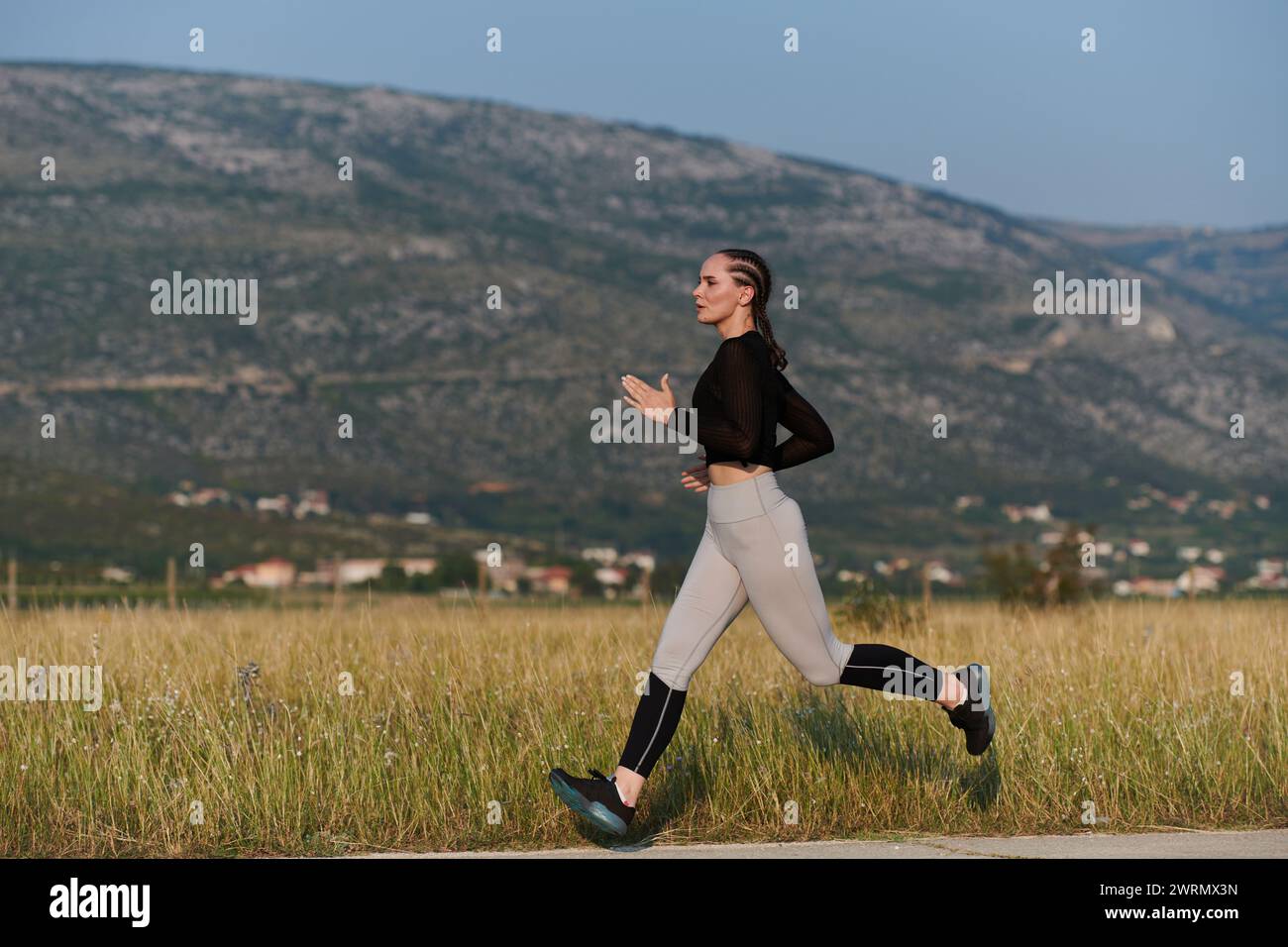 Solo Stride: Determined Athlete Woman Embarks on Fitness Journey for ...