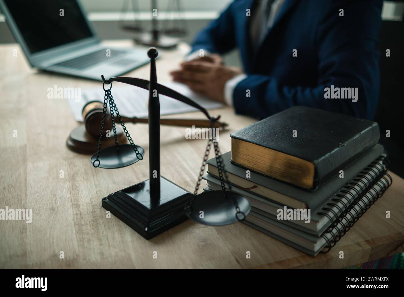 Brass scales are placed on lawyers desks in legal advice offices as a ...