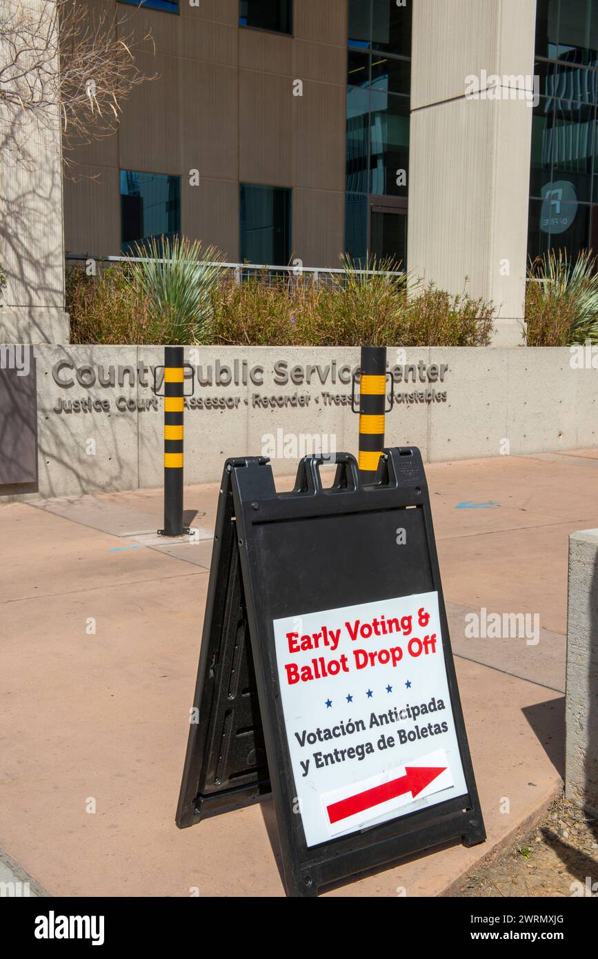 Early voting and ballot drop off sign board in English and Spanish in ...