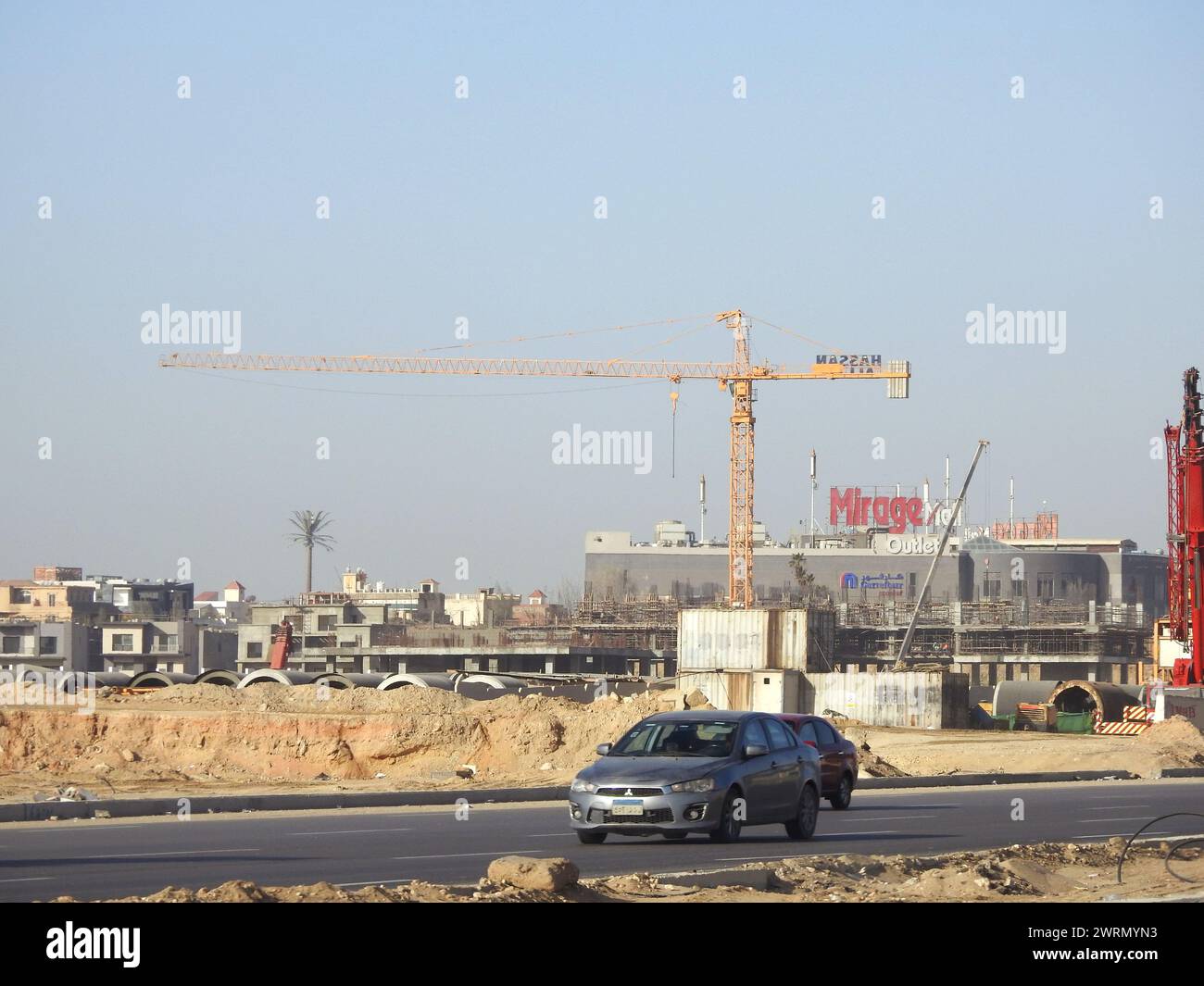 Cairo, Egypt, March 2 2024: A crane tower of Hassan Allam Co, A construction site of new high ...