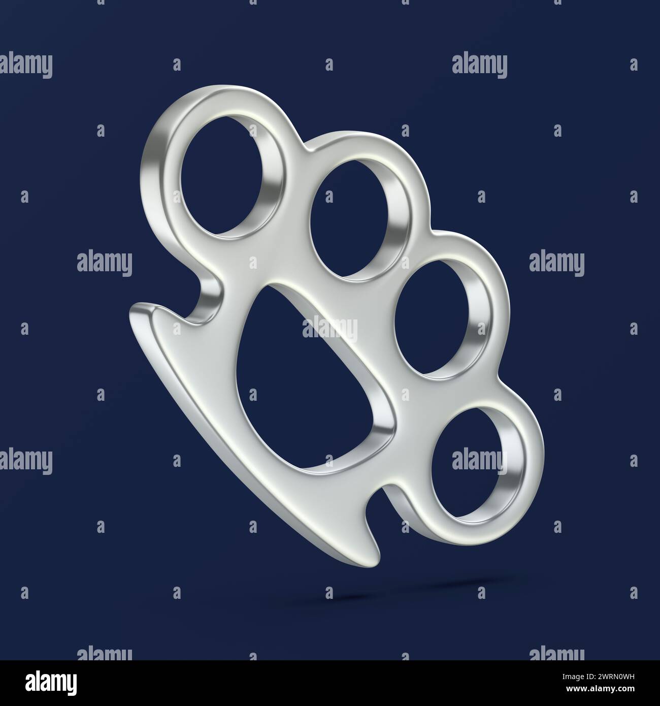 Silver brass knuckles on dark blue background Stock Photo - Alamy