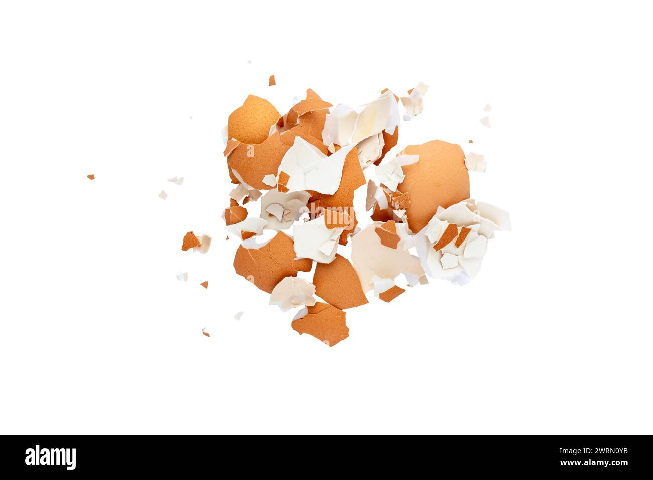 Pile of broken eggshell isolated on white background. Top view flat lay ...