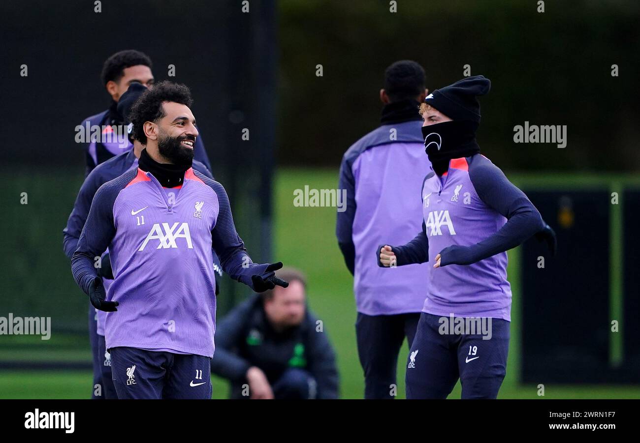 Liverpool's Mohamed Salah and Harvey Elliott (right) during a training ...
