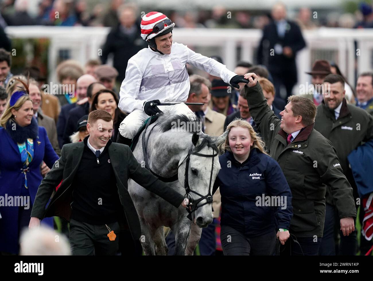 Harry Skelton alongside trainer Dan Skelton (right) after winning the ...
