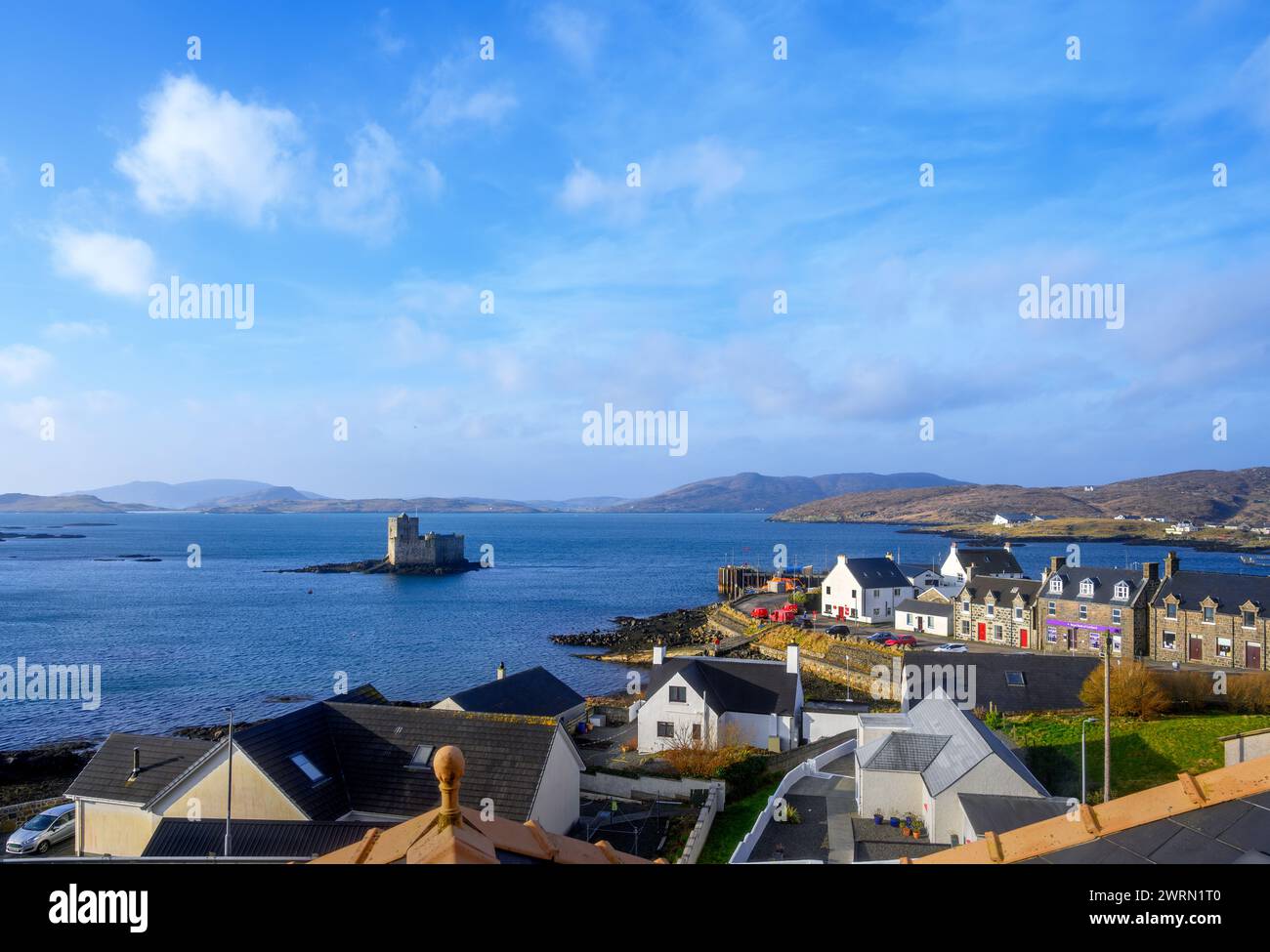 View over the village of Castlebay and Kisimul Castle in the early ...