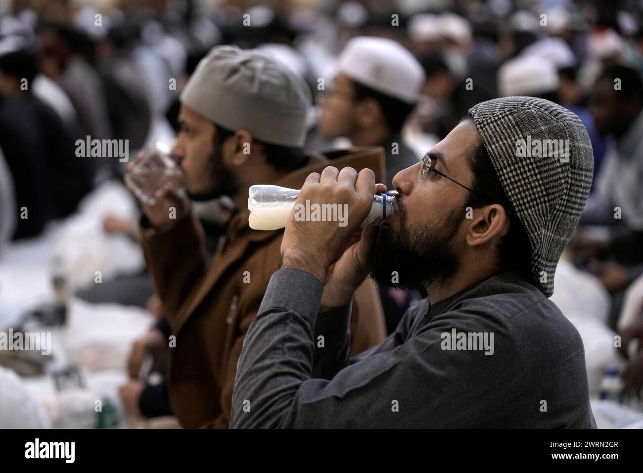 Muslims break their fast during the Muslims holy fasting month of ...