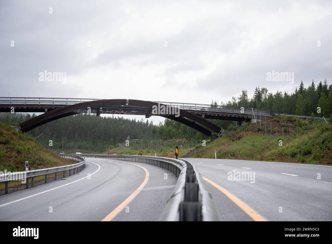 highway in Norway in a mountain bend over which a bridge has been built for animals Stock Photo ...