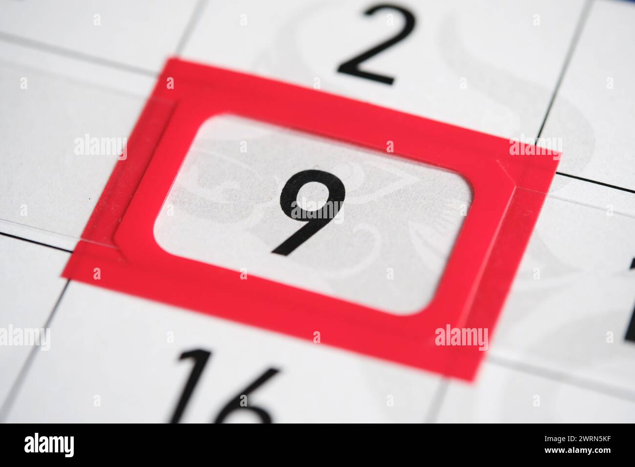 Calendar date. The 9th number the calendar is highlighted in a red ...